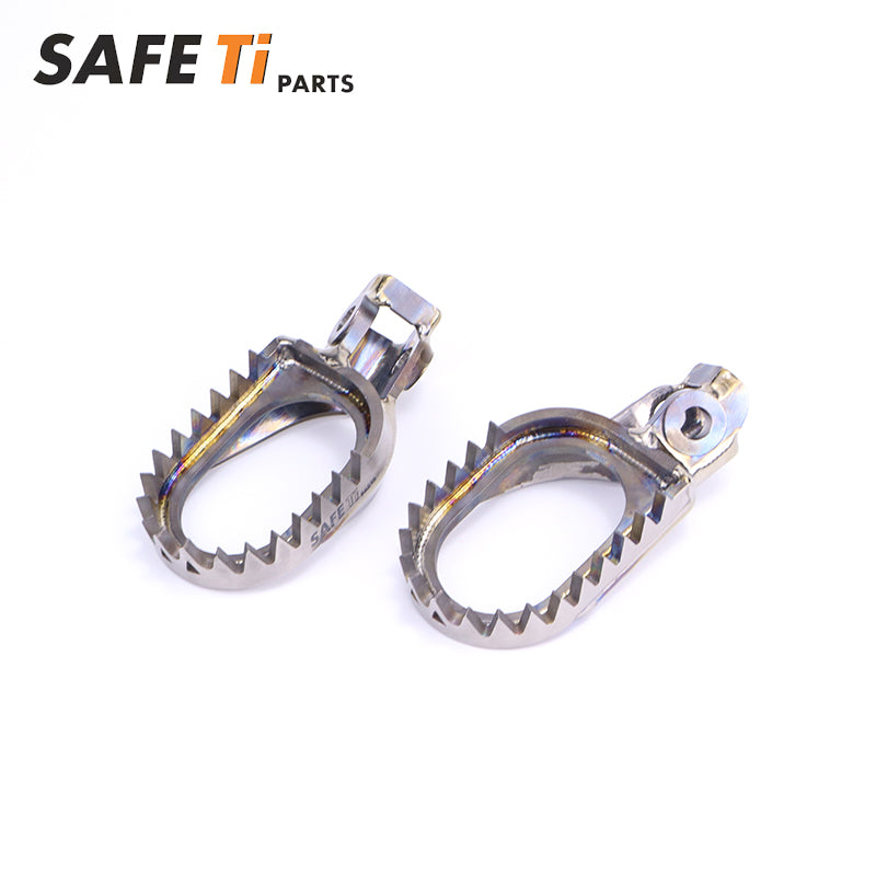 Titanium footpegs for TM racing – SAFETi